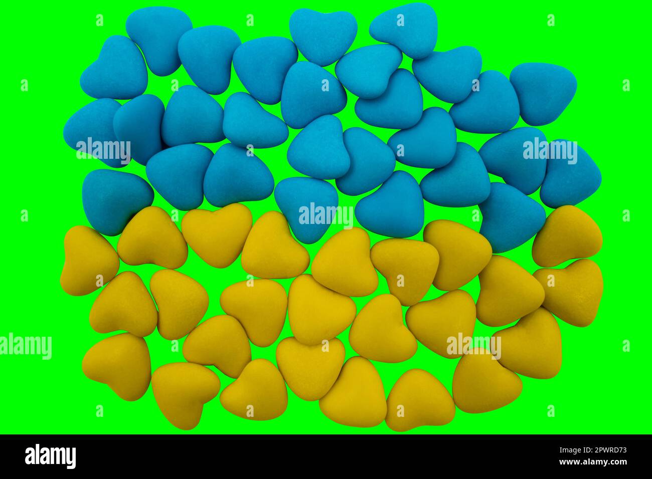 Yellow and blue heart-shaped candies laid out in the form of the ...
