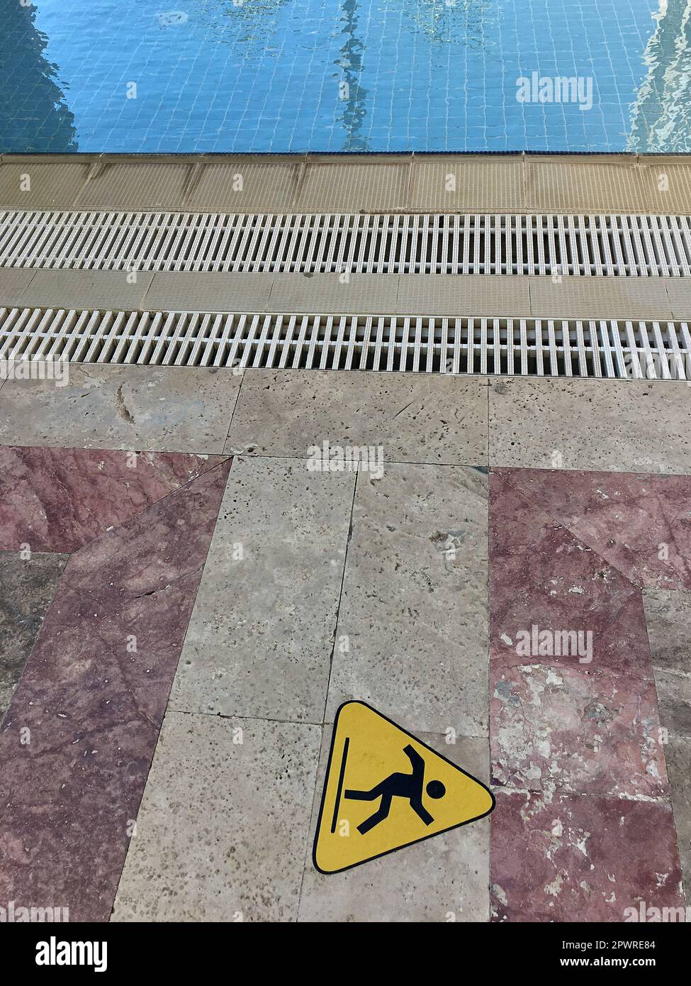 Slippery sign on the floor Stock Photo - Alamy