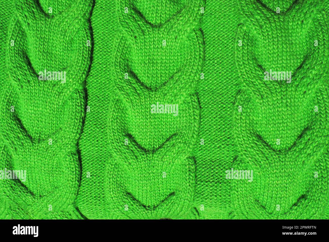 Pigtail knit. Pattern of knitted fabric. Green yarn. Front and back ...