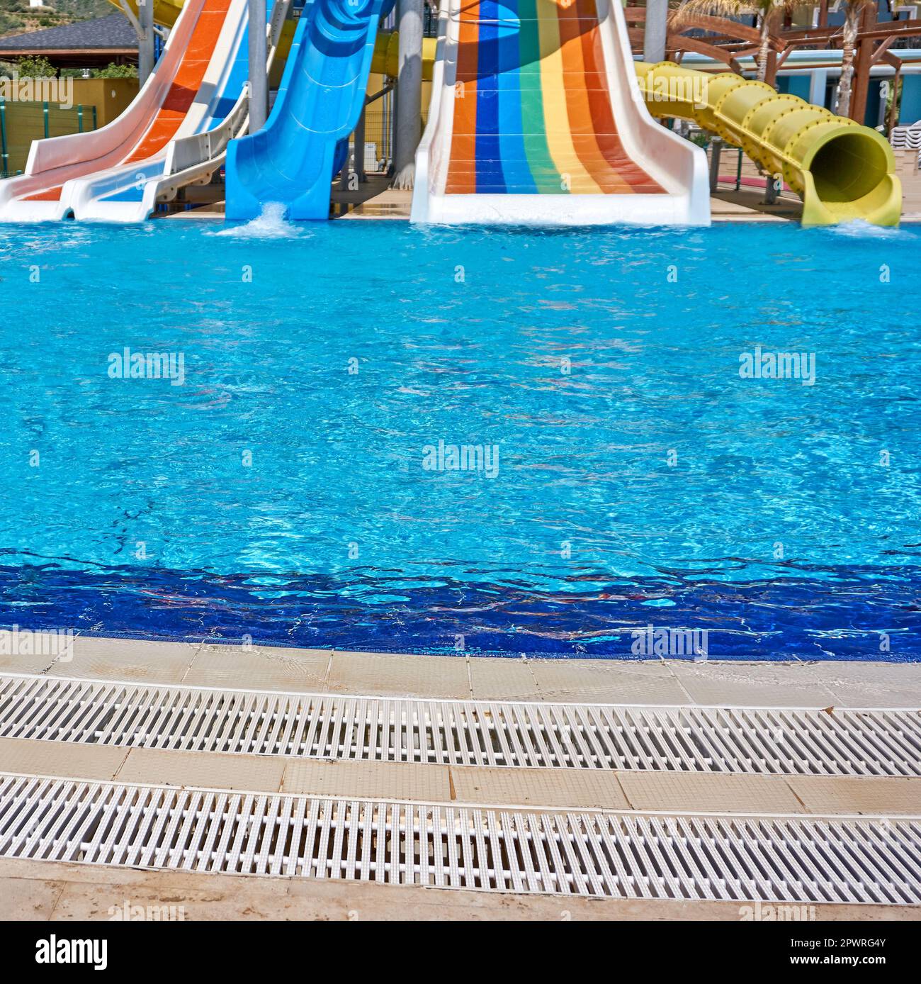 Colorful kids waterpark and a swimming pool Stock Photo - Alamy