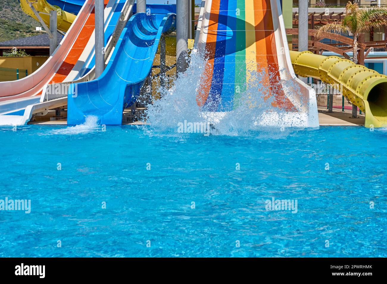 Colorful kids waterpark and a swimming pool Stock Photo - Alamy