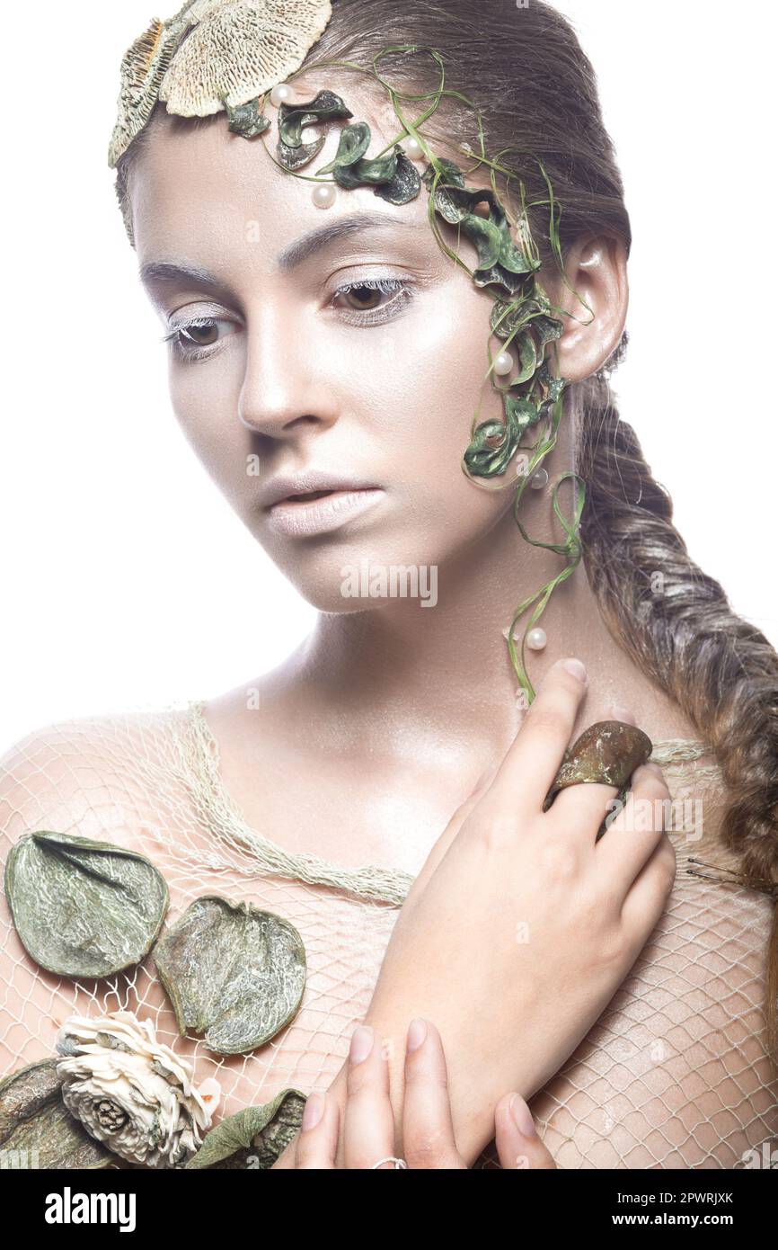 Beautiful fashionable girl in image of sea fairies with shells and ...