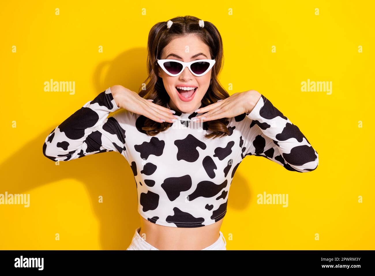 Photo of positive crazy cowgirl in sunglass spotted clothes enjoy ...