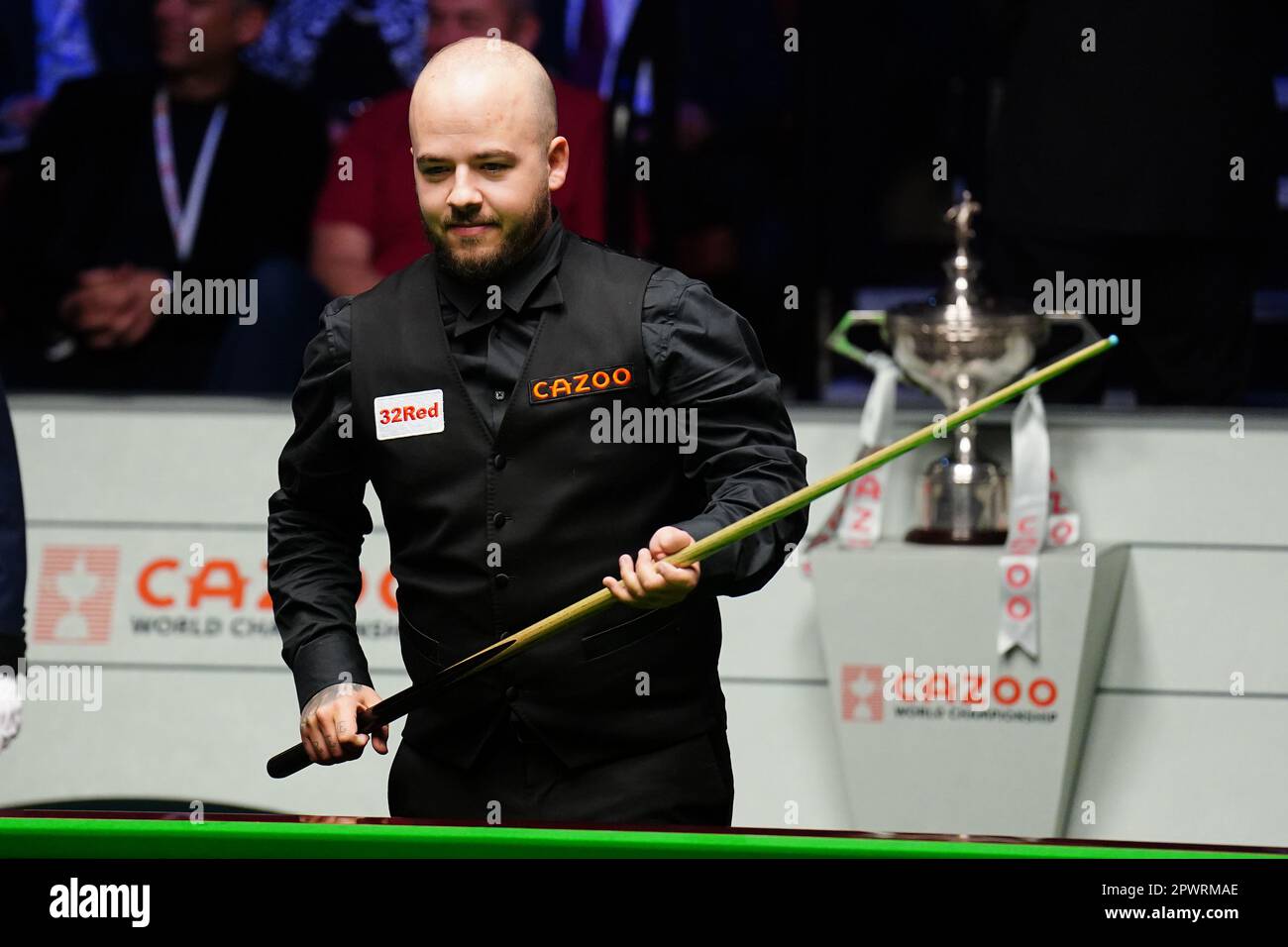 Luca Brecel in action against Mark Selby (not pictured) during the ...