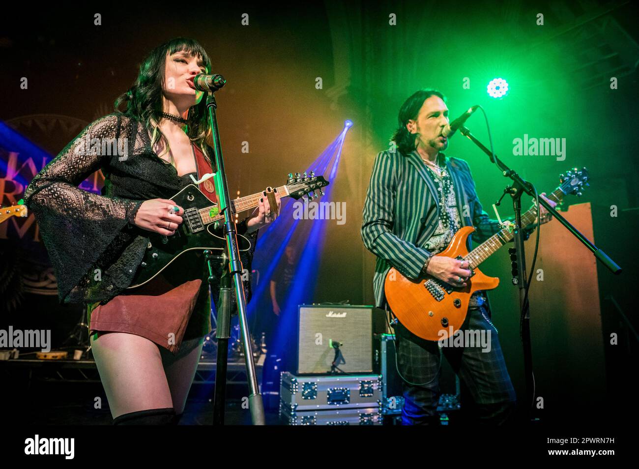 Grace Bond on mandolin & vocals, Aaron Bond on guitar & vocals Stock ...