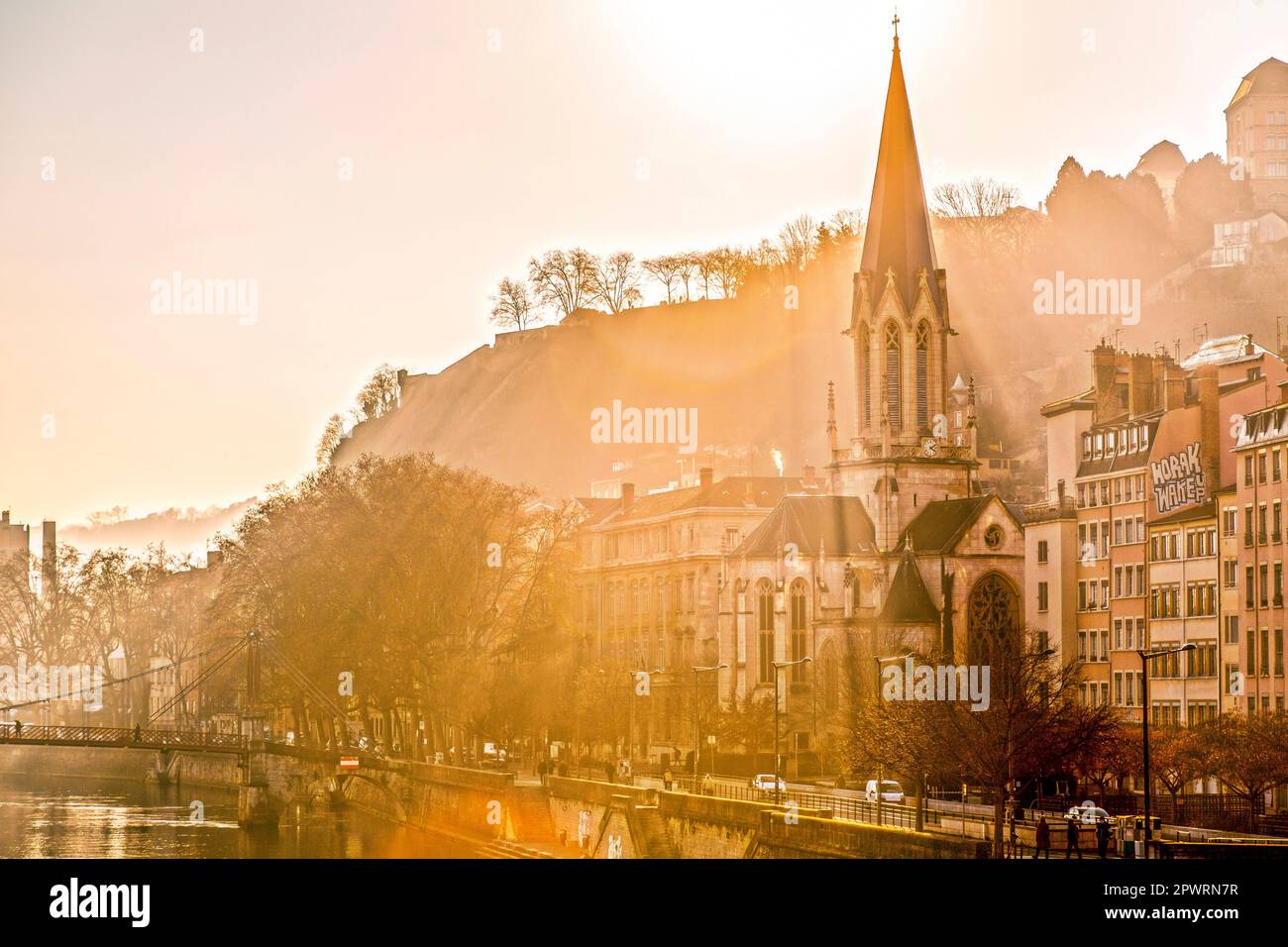 St. George Church and buildings around the River Saone, the old town of ...