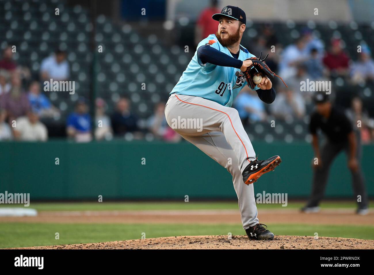 Relief pitcher Matt Gage (91) of the Sugar Land Space Cowboys pitches ...