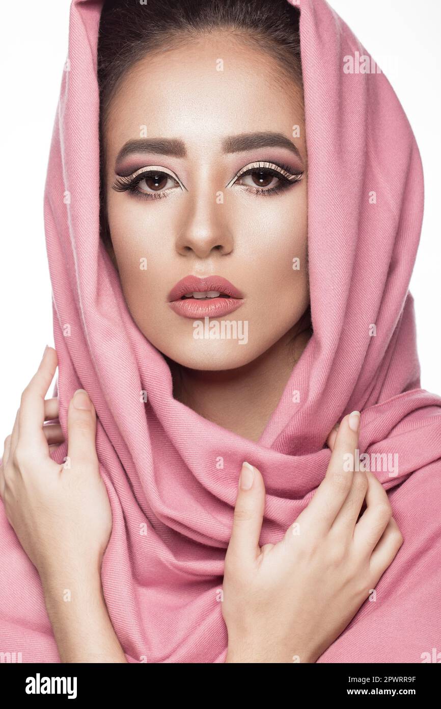 Beautiful girl in the Arab scarf with oriental make-up. Beauty face ...