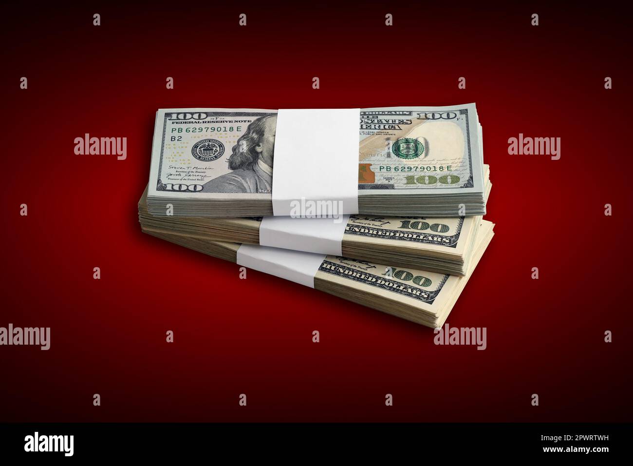 Bundle of US dollar bills on crimson red background. Pack of american ...