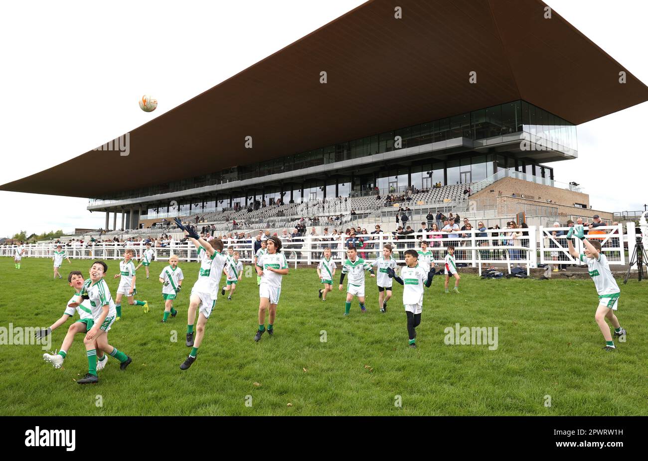 Moorefield and Sarsfields GAA youth teams plays a match on the field in ...