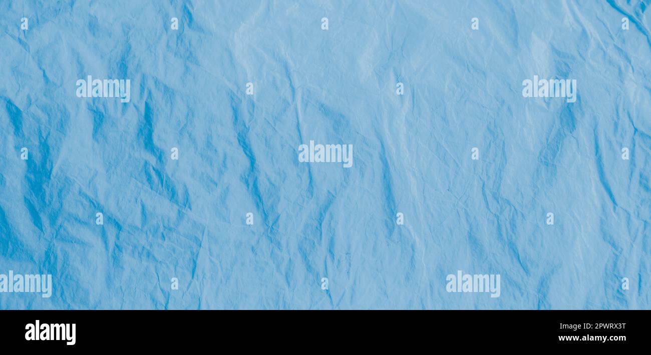 Blue crumpled paper texture background. Blue old creased and wrinkled ...