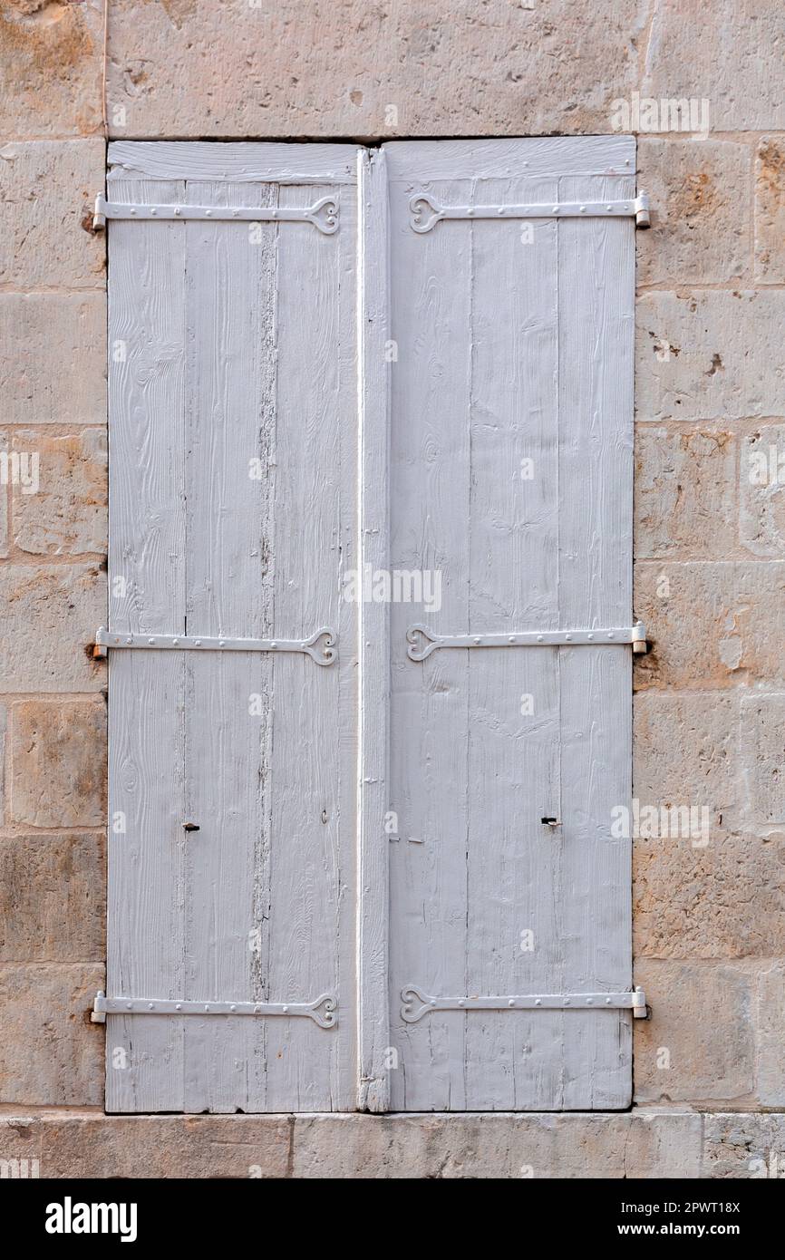 Windows with wooden shutters, architectural detail close up texture ...