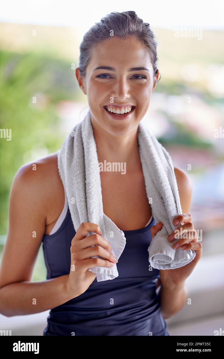 Nothing beats the rejuvenating feeling after a workout. Portrait of an ...