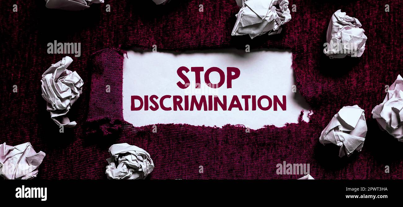 Hand writing sign Stop Discrimination, Concept meaning Prevent Illegal ...