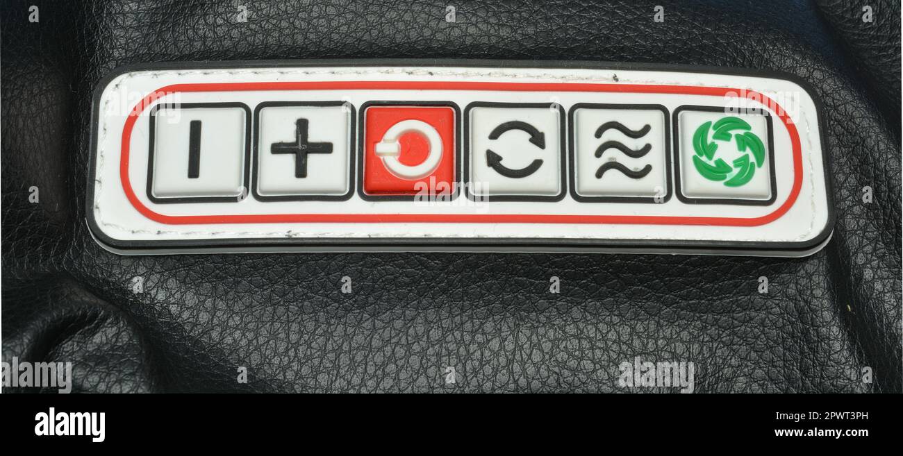 Command buttons on Mat - Black leather massager Stock Photo - Alamy