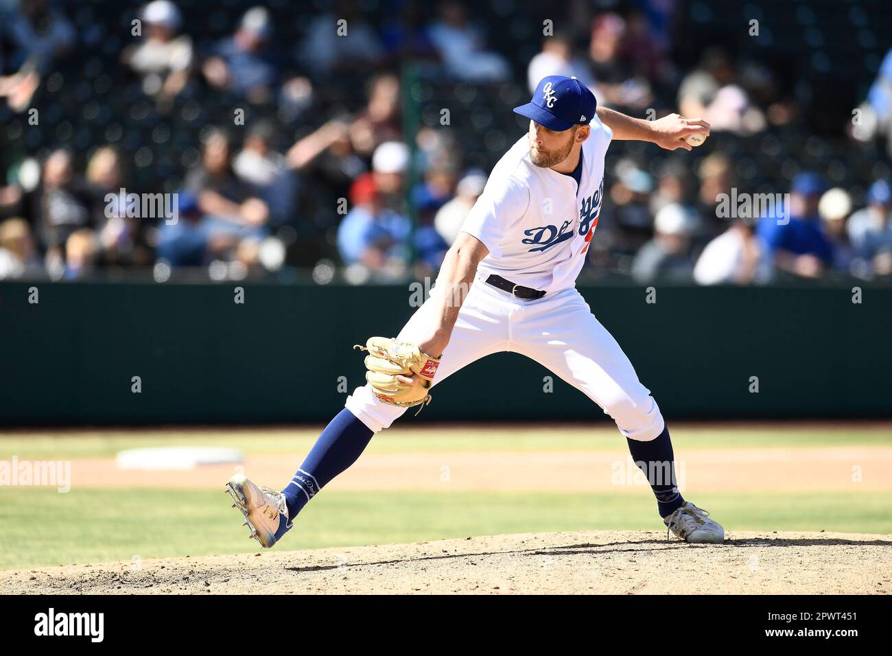 Relief pitcher Adam Kolarek (56) of the Oklahoma City Dodgers pitches ...