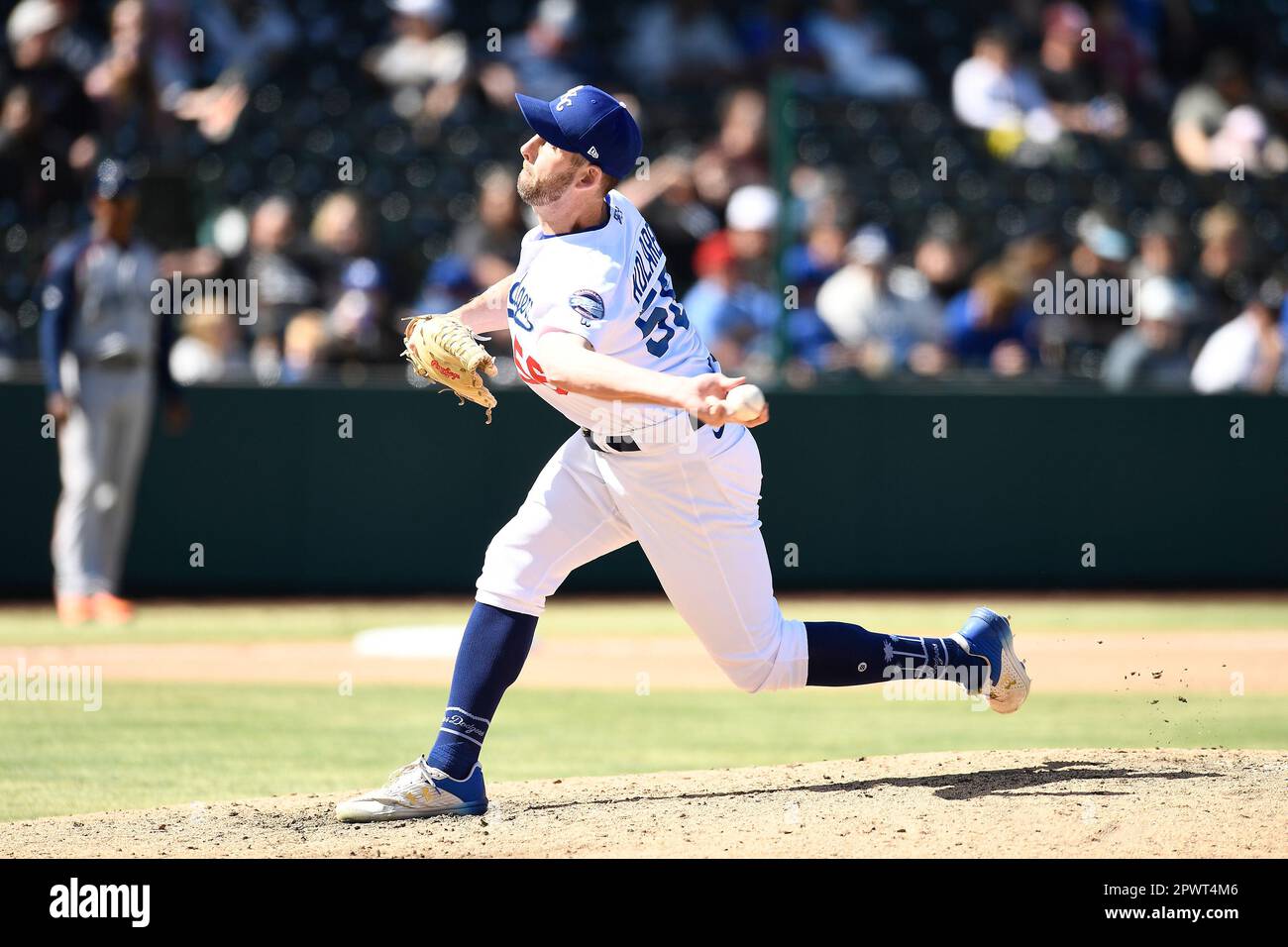 Relief pitcher Adam Kolarek (56) of the Oklahoma City Dodgers pitches ...