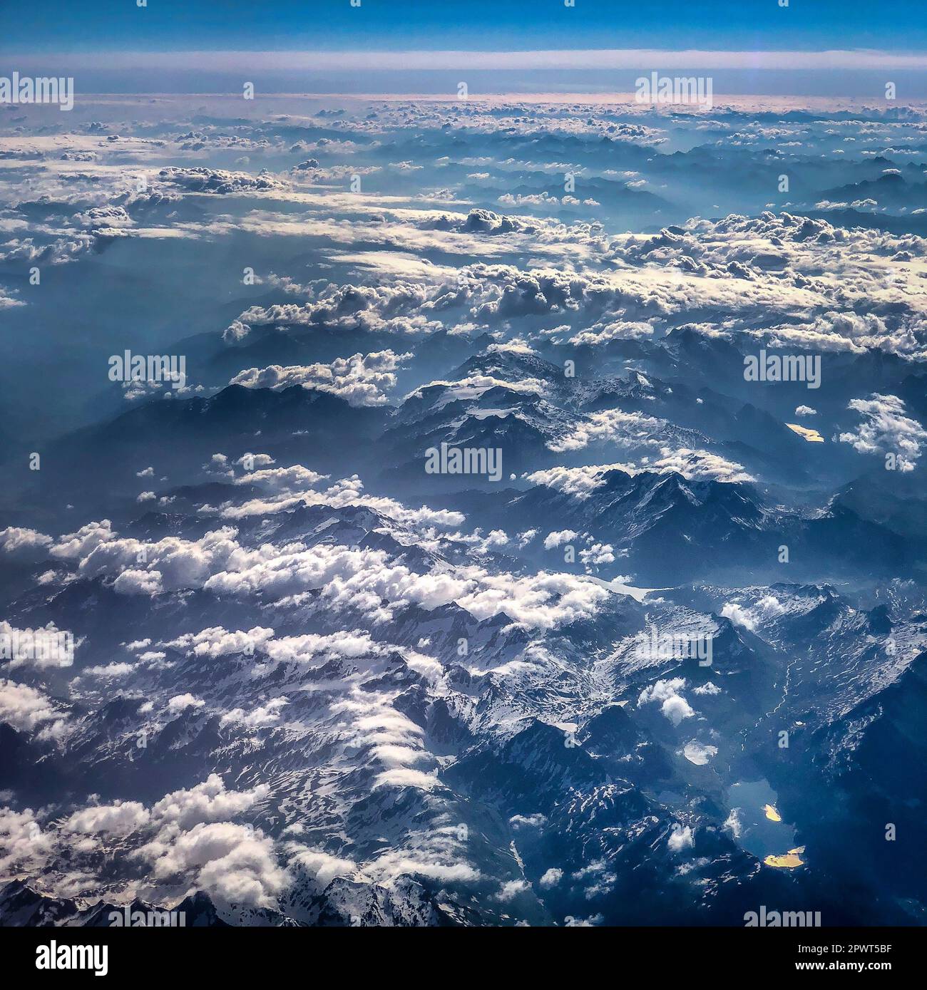 Mountains from a plane hi-res stock photography and images - Alamy