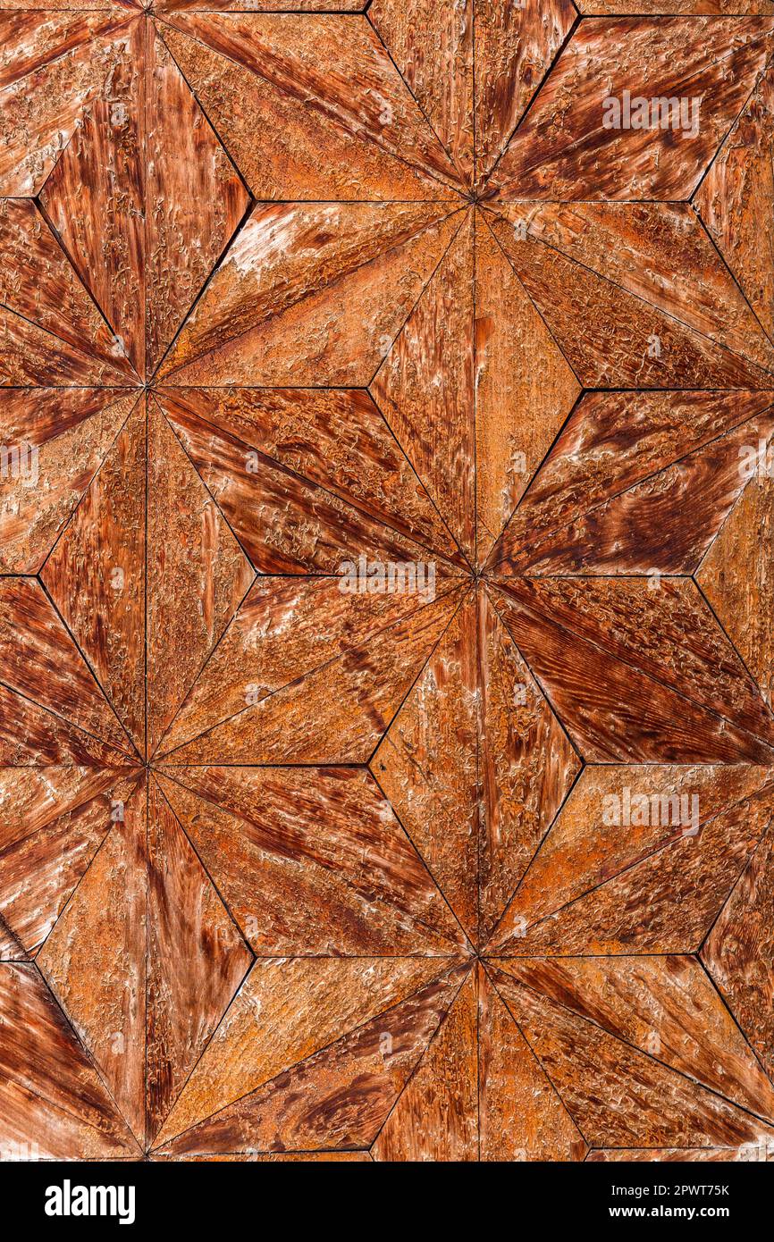 Star shaped weathered wooden panel design, close up texture background ...