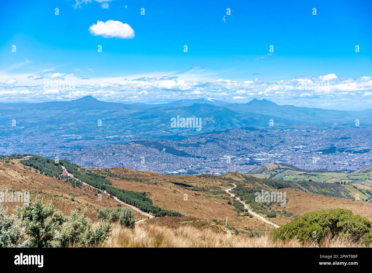 View of volcanoes and mountains above the city of Quito in Ecuador ...