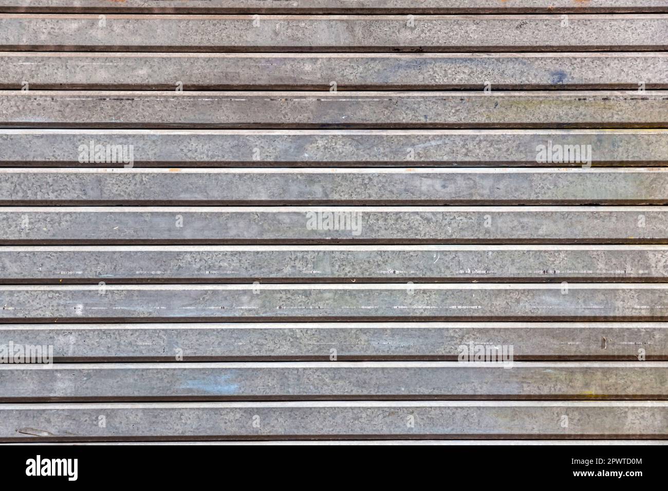 Grunge metal garage door texture background, distressed fragment close ...