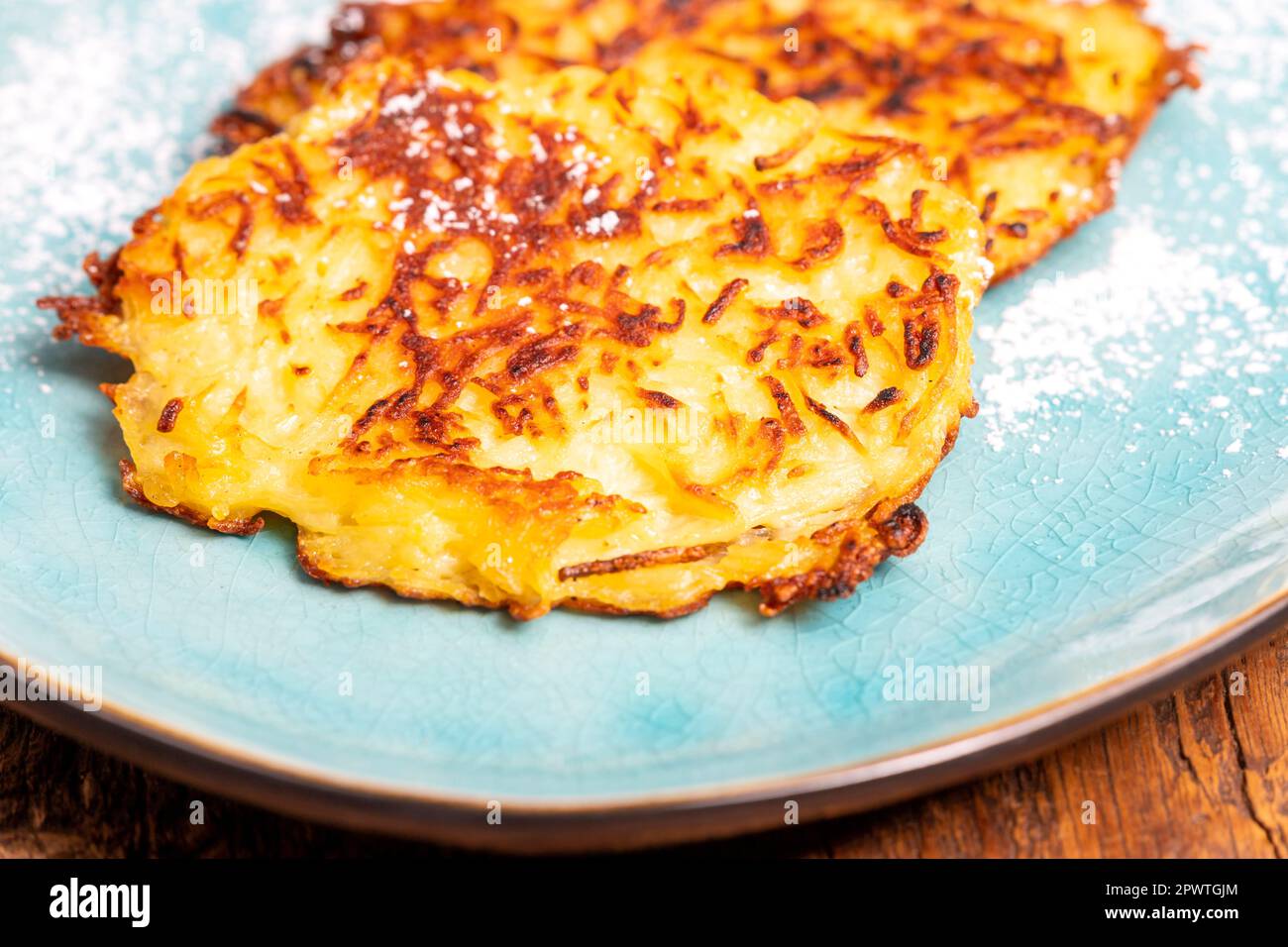 bavarian sweet hash browns on a plate Stock Photo - Alamy