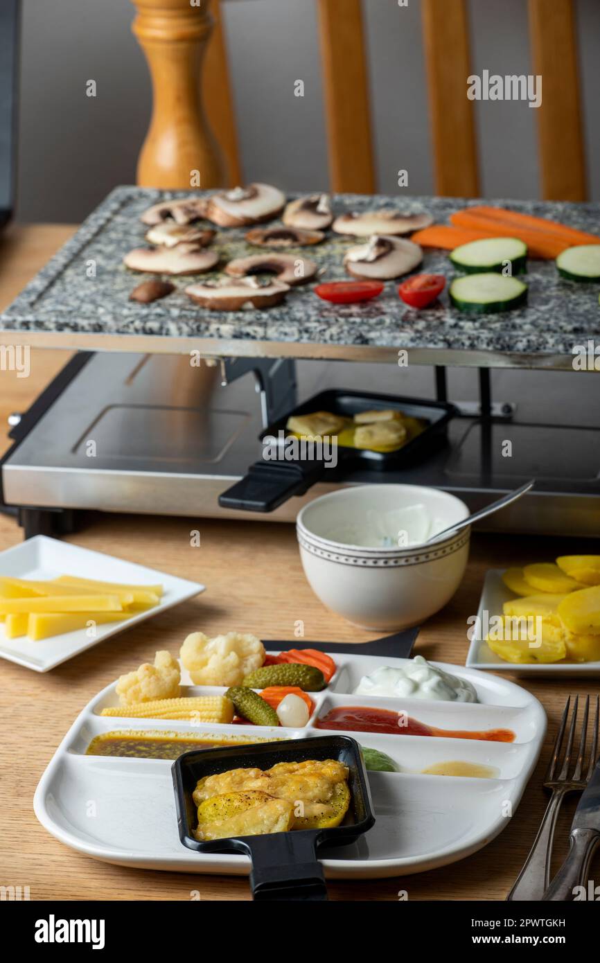 Raclette cheese potatoes ham hi-res stock photography and images - Alamy