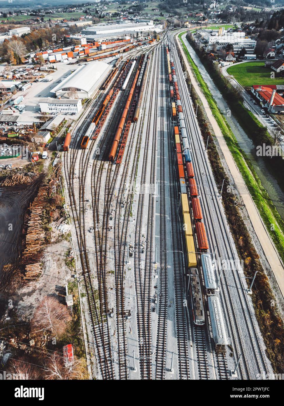 Cargo trains close-up. Aerial view of colorful freight trains on the ...