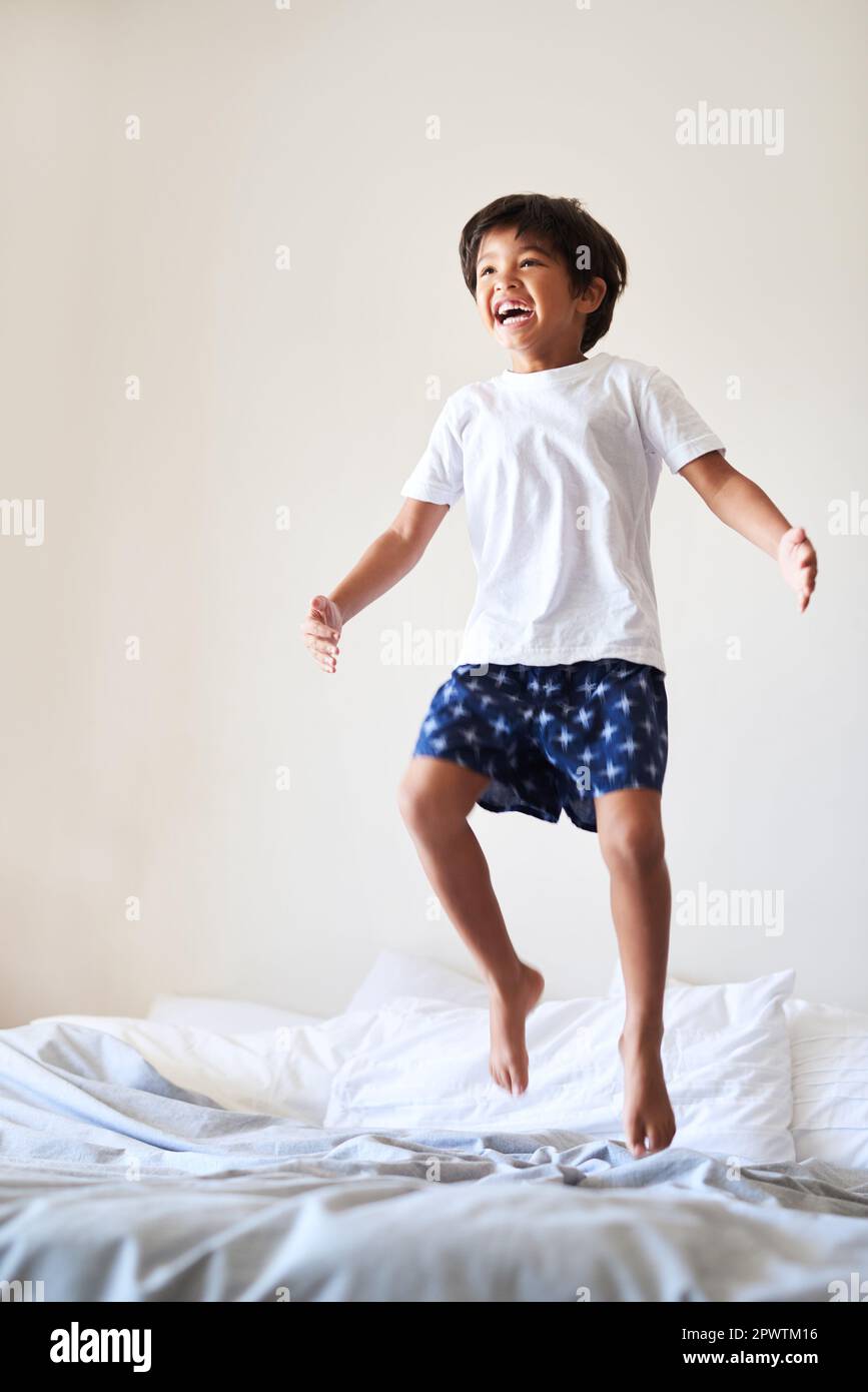 Going higher and higher with every leap. Full length shot of an ...