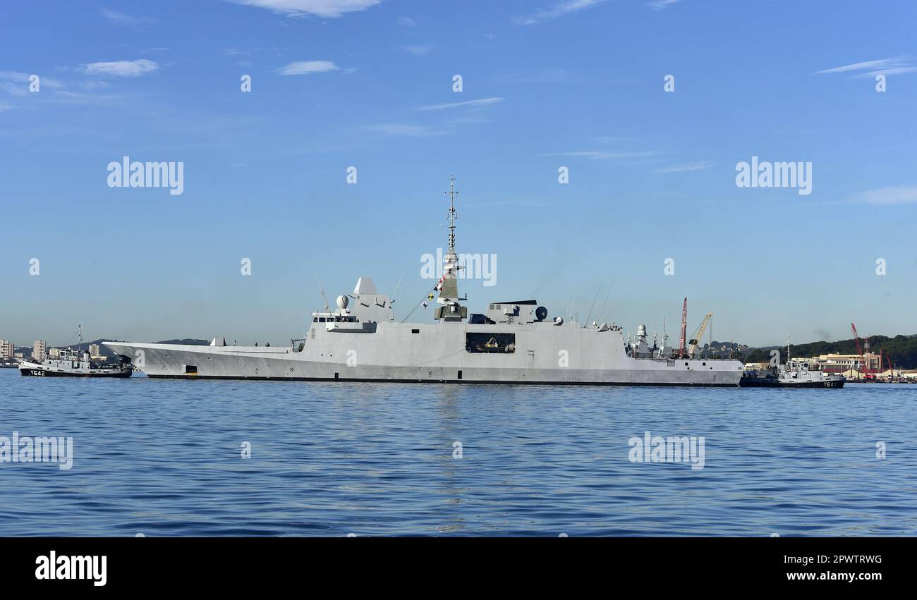 French Navy multi-mission frigate casting off in the harbor of Toulon ...