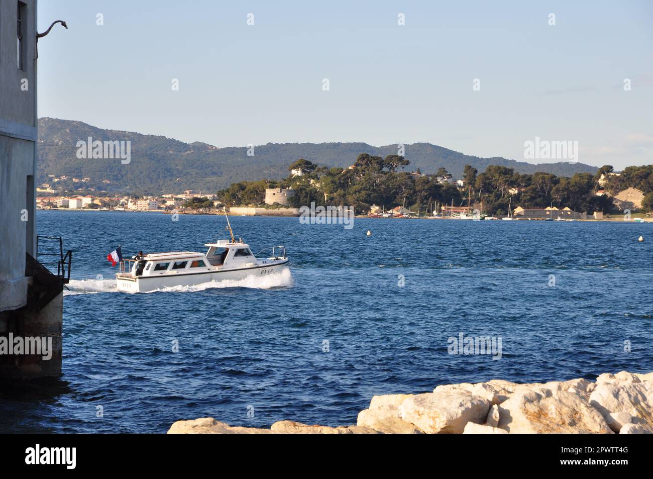 Major canoe of the French Navy in the harbor of Toulon Stock Photo - Alamy
