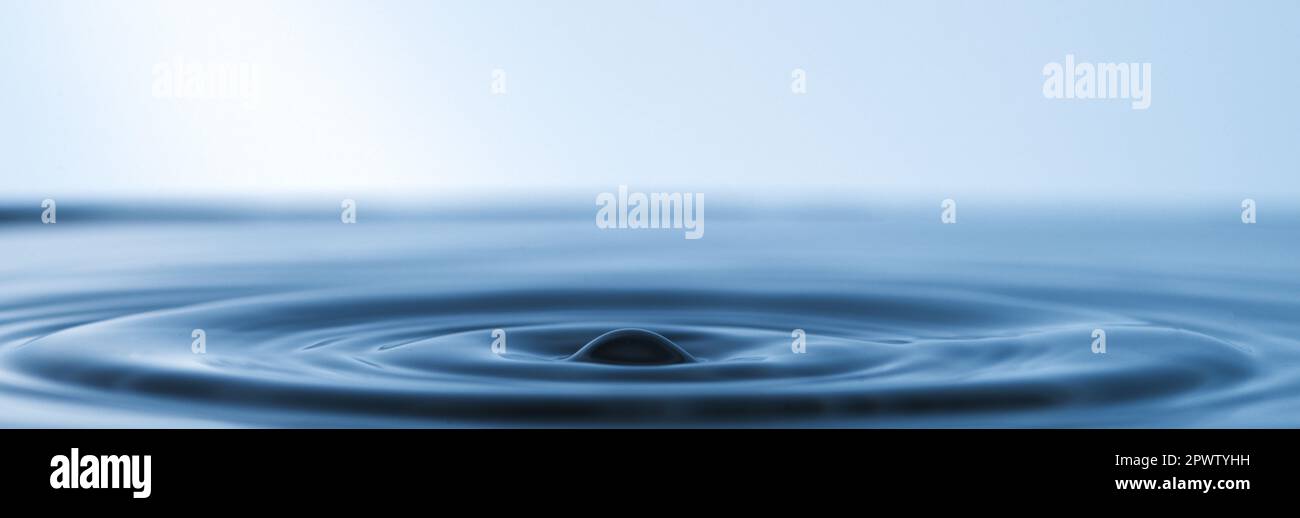 Abstract studio shot of ripples in a puddle of water Stock Photo - Alamy