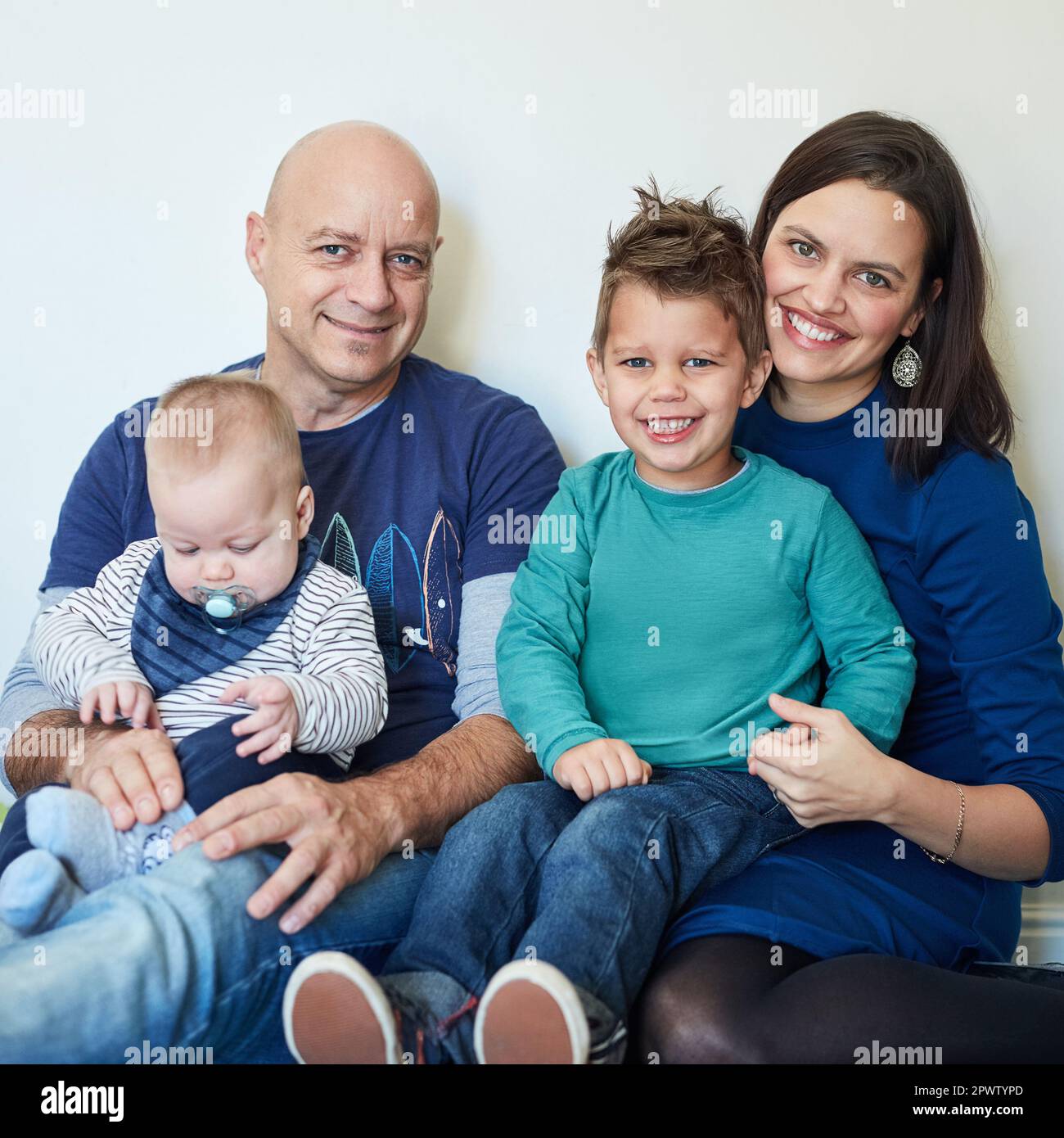Portrait of a happy family bonding together at home Stock Photo - Alamy