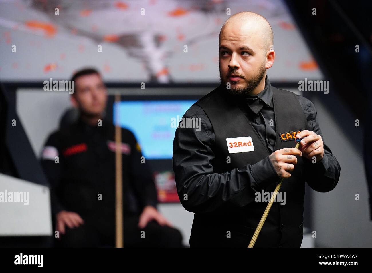 Luca Brecel in action against Mark Selby (not pictured) during the ...