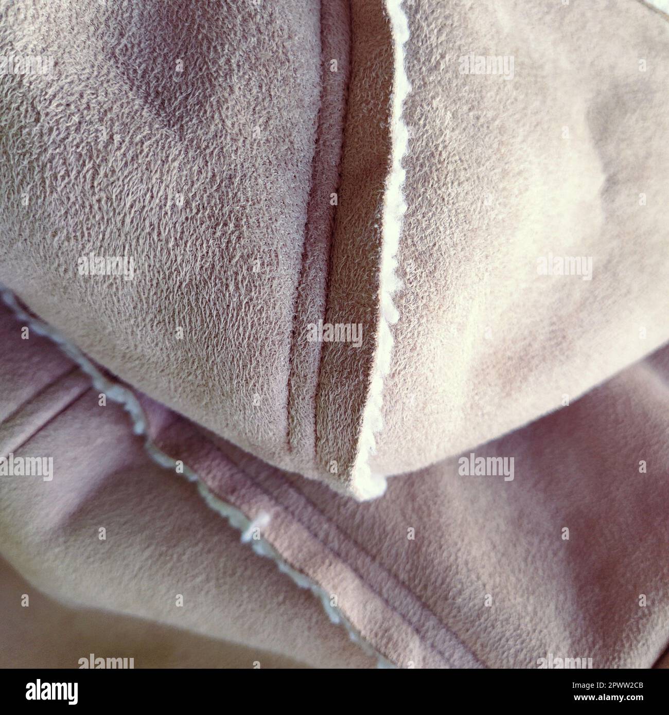 Suede outerwear with a hood. Beige faux suede with sheepskin on the ...