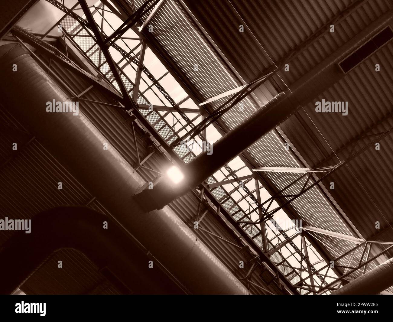 The roof of a hangar, a production hall or a sports hall. Metal ...