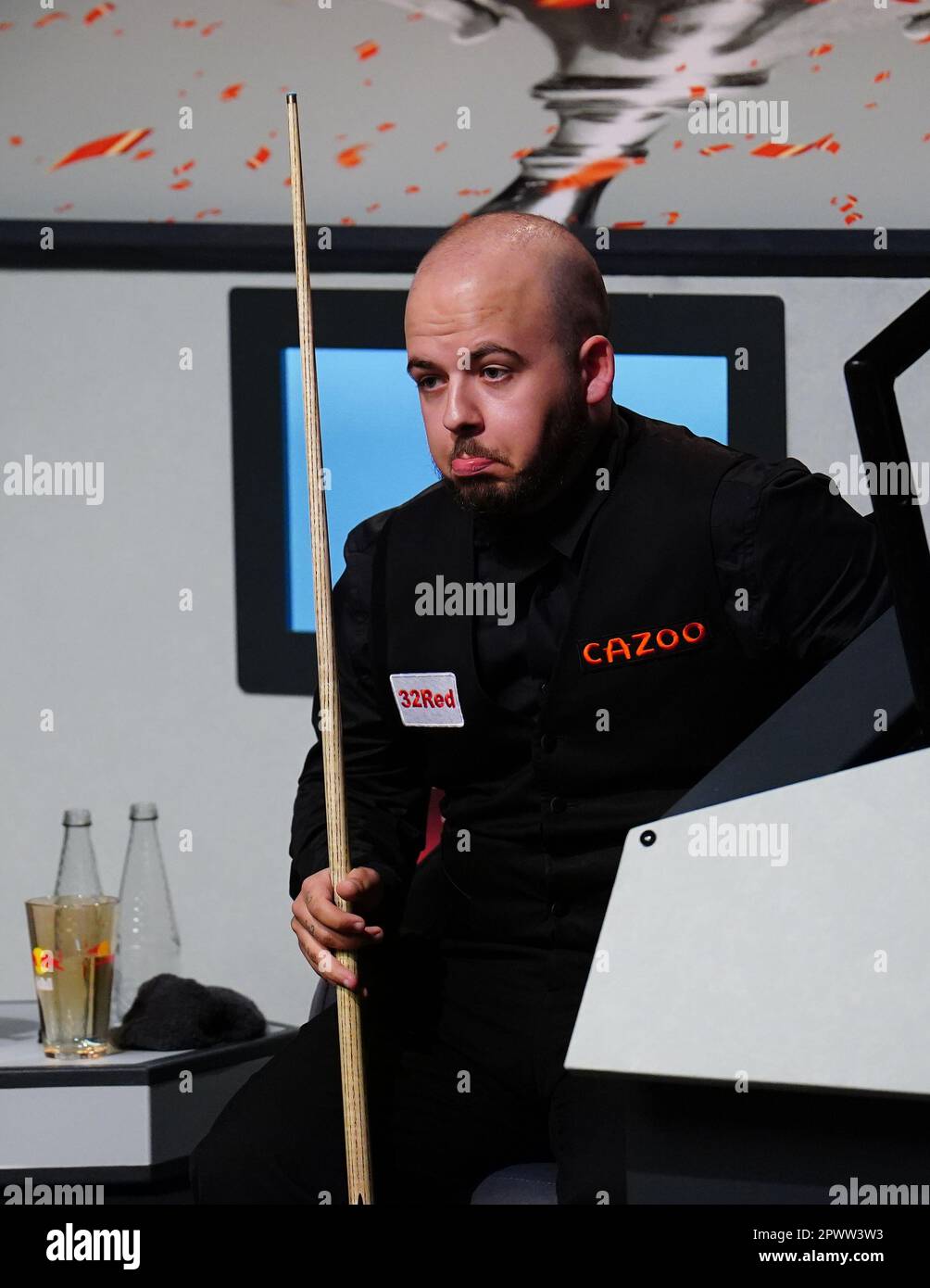 Luca Brecel in action against Mark Selby (not pictured) during the ...