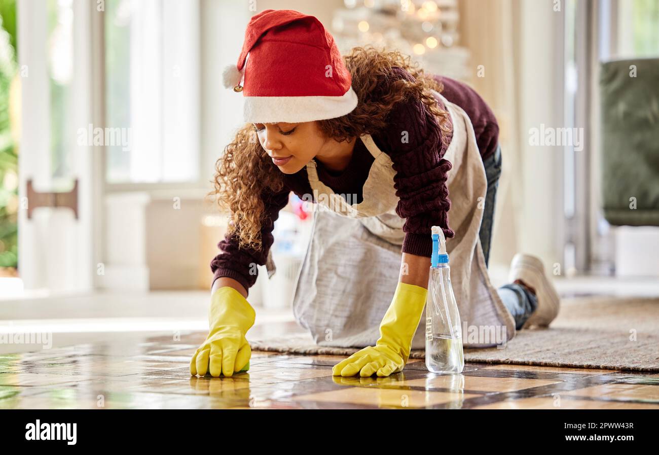 Theyre as good as new. a young woman washing the floors at home Stock ...