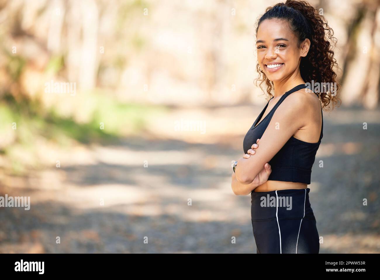 taking in the fresh air. a young woman taking a break during an outdoor ...