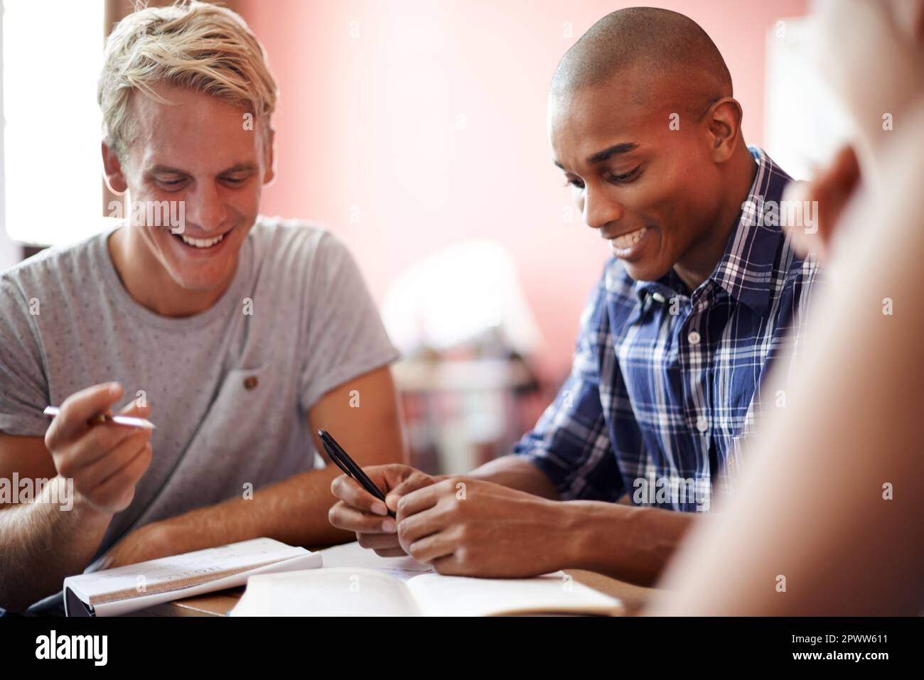 Working hard for good grades. university students during class Stock ...