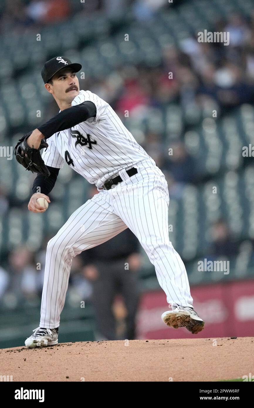 Chicago White Sox starting pitcher Dylan Cease winds up during a ...