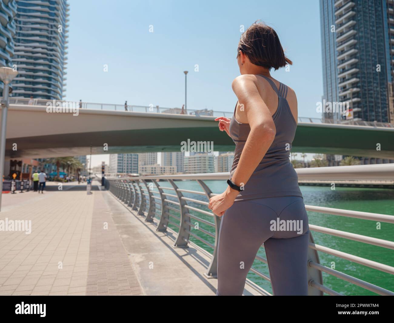 City Running - asian woman runner , Dubai marina urban scene in ...