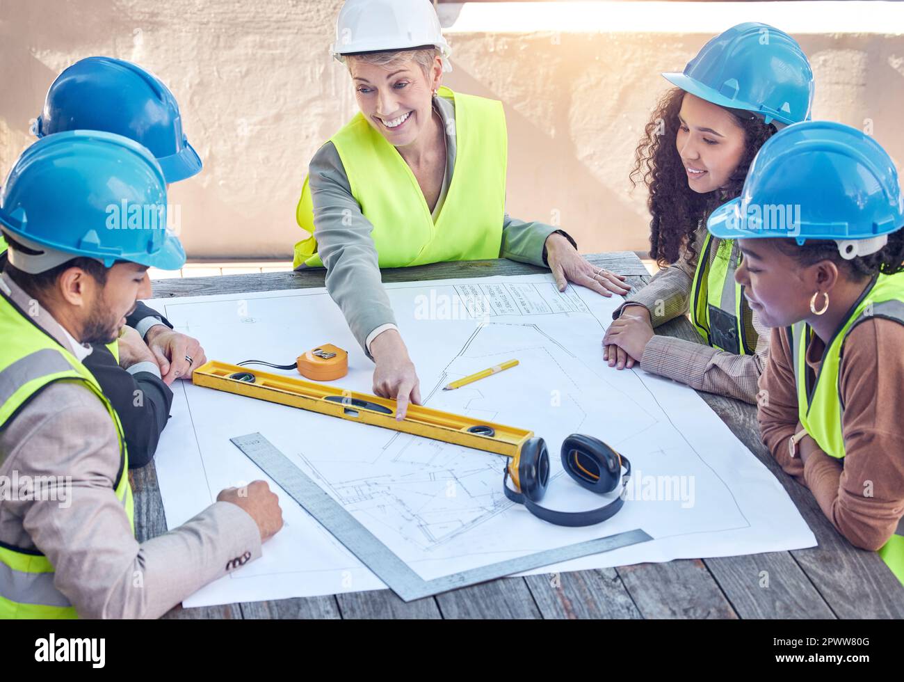 Making sure everything goes according to plan. a group of construction ... Making sure everything goes according to plan. a group of construction ...