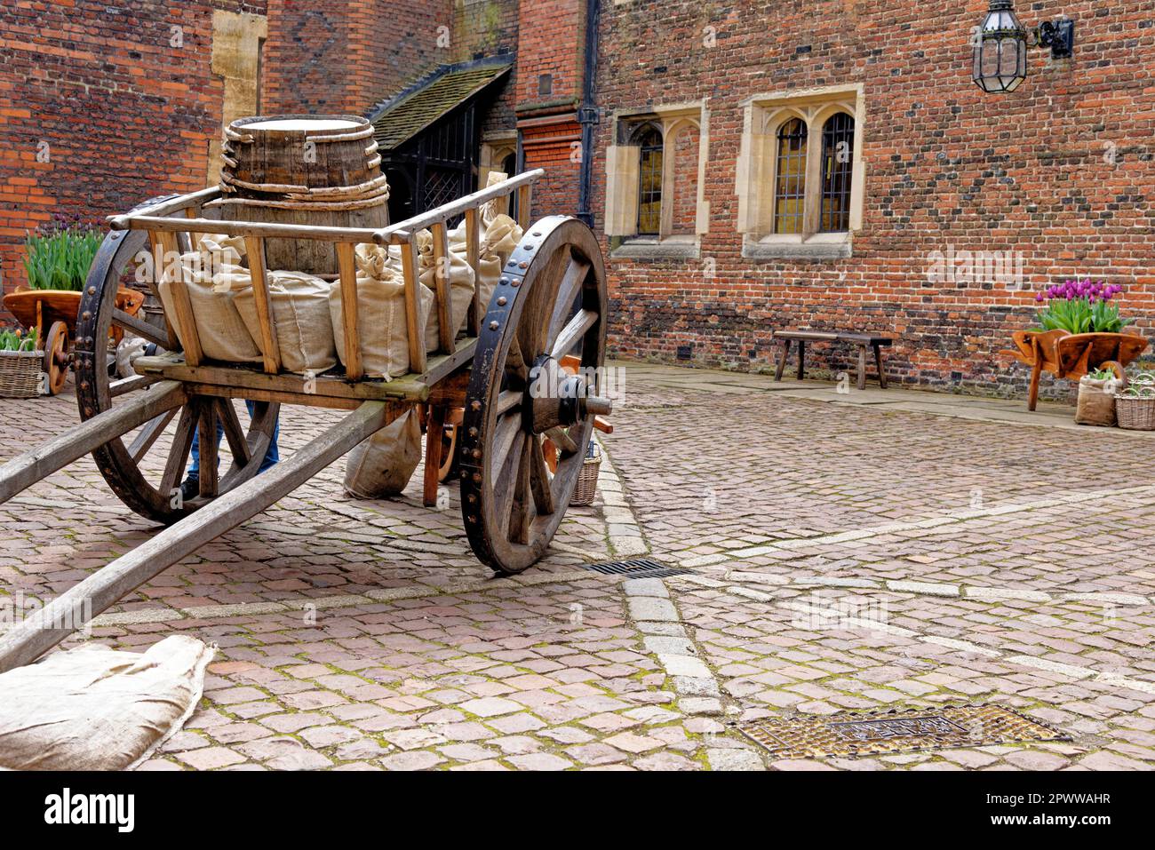 Old horse drawn wooden cart with wine barrel on display - English ...
