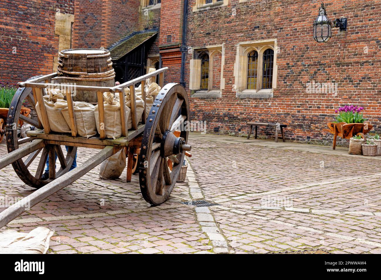 Old horse drawn wooden cart with wine barrel on display - English ...