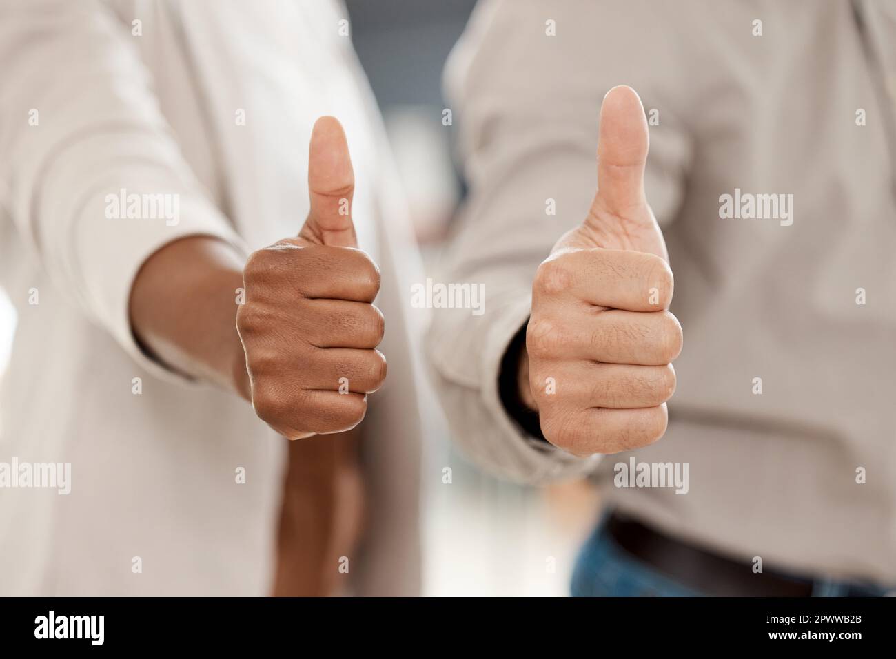 Never give up on a dream. two unrecognizable call centre agents showing ...