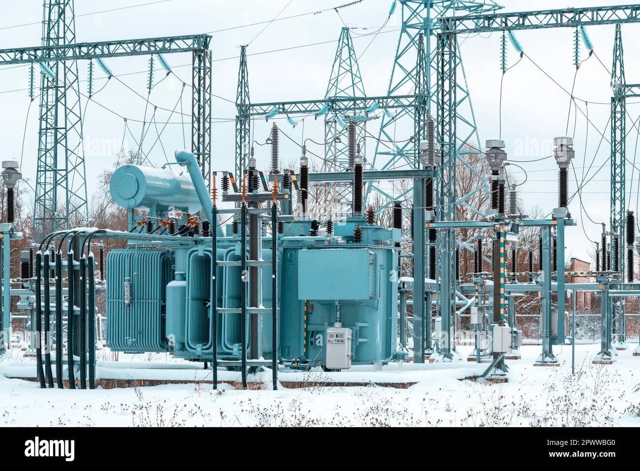 Power transformer at the electrical substation. Power engineering. Cold ...