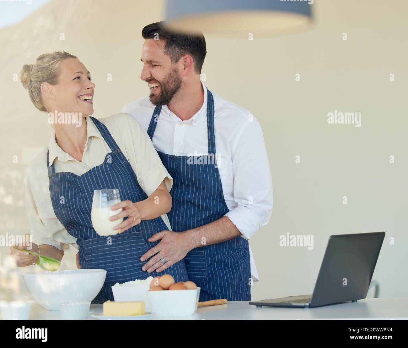These cooking lessons are a bonding experience. a young couple cooking ...