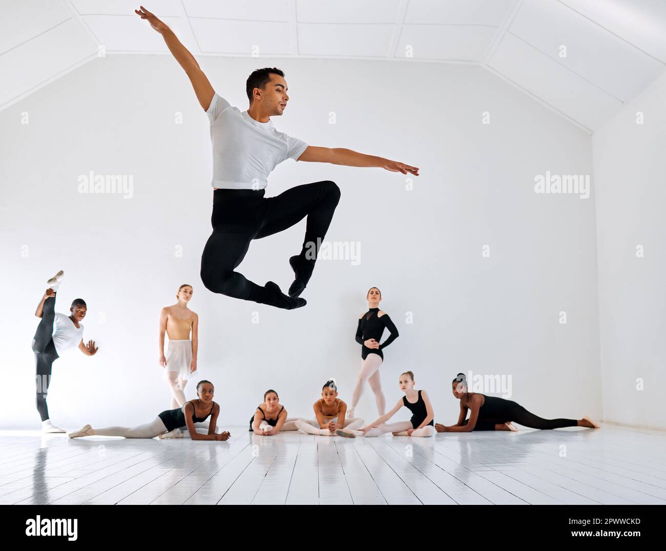 Dancing is his passion. Full length shot of a diverse group of ballet ...