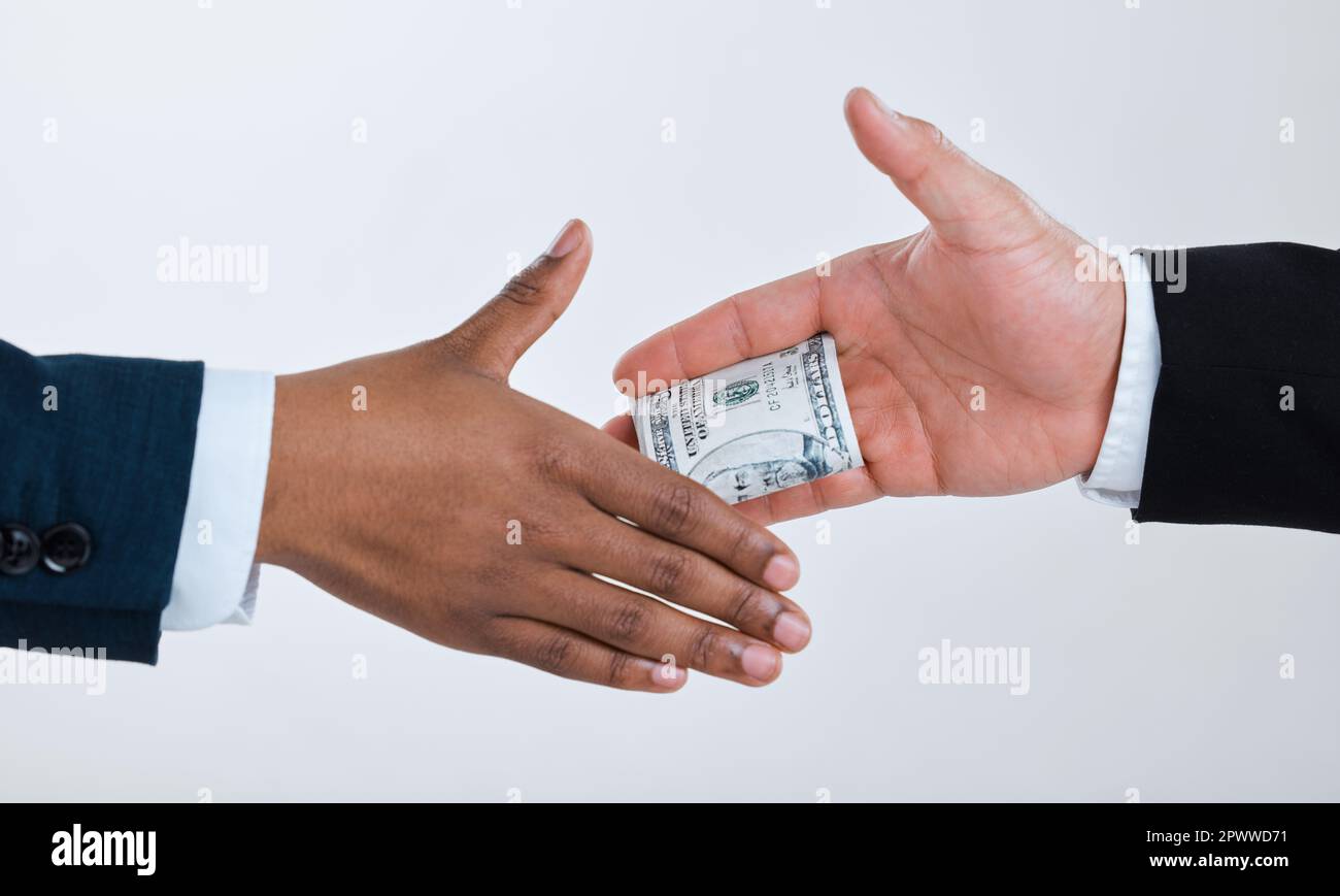 Businessman giving money another businessman hi-res stock photography ...